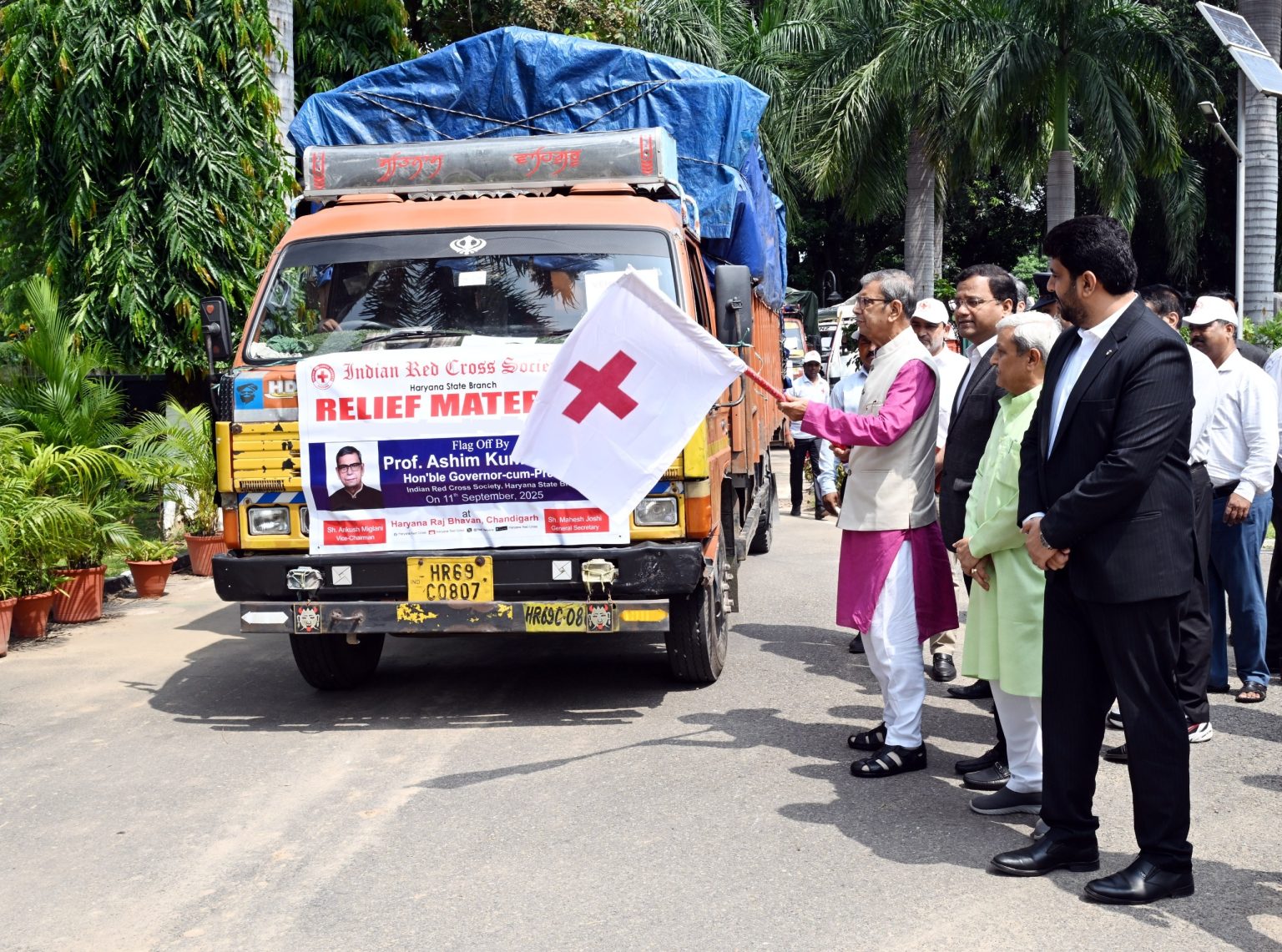 Governor Prof Ashim Kumar Ghosh flags off relief trucks for people ...